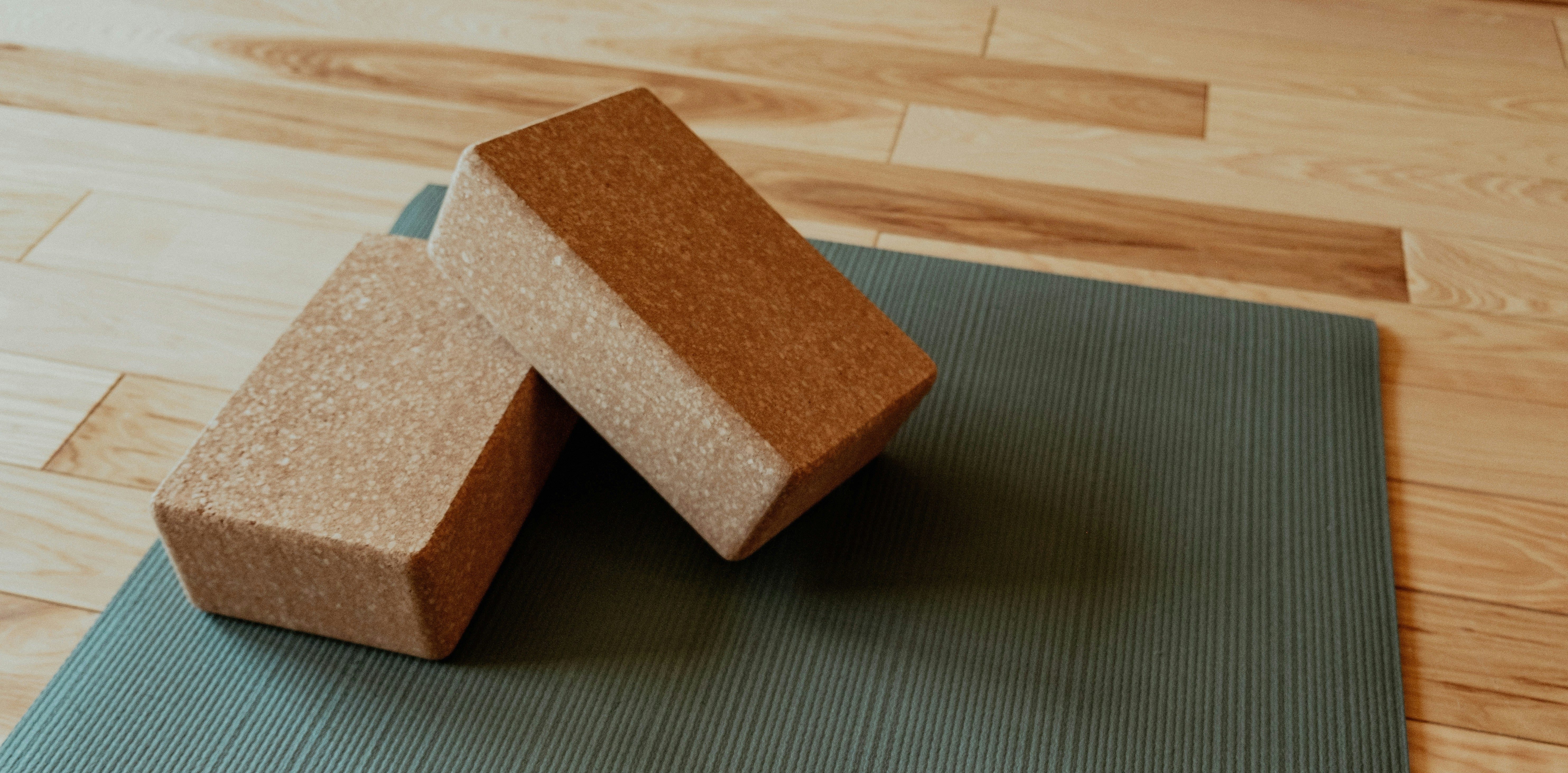Essential Yoga Props & Equipment: Bolsters, Towels, Chairs, and More ...